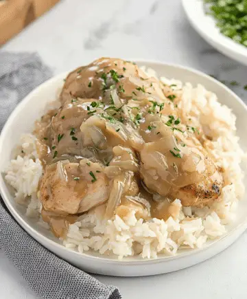 Smothered Chicken And Rice Recipe - sandyrecipes.com