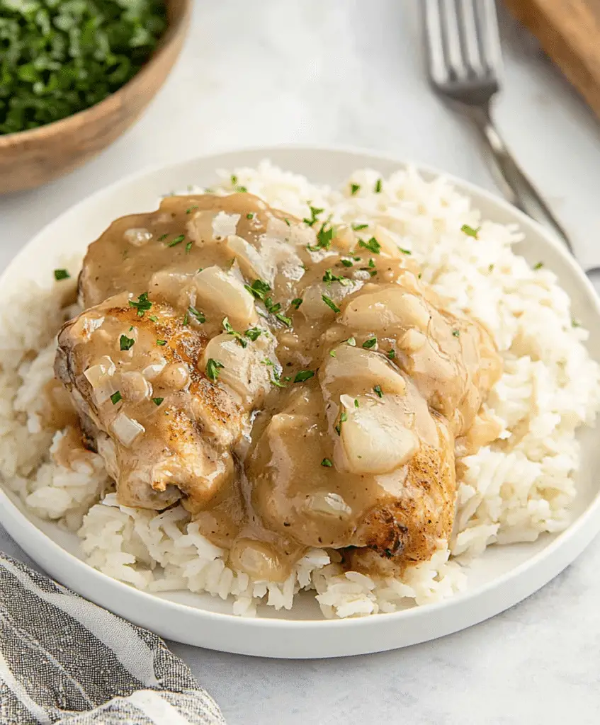 Smothered Chicken And Rice Recipe - sandyrecipes.com